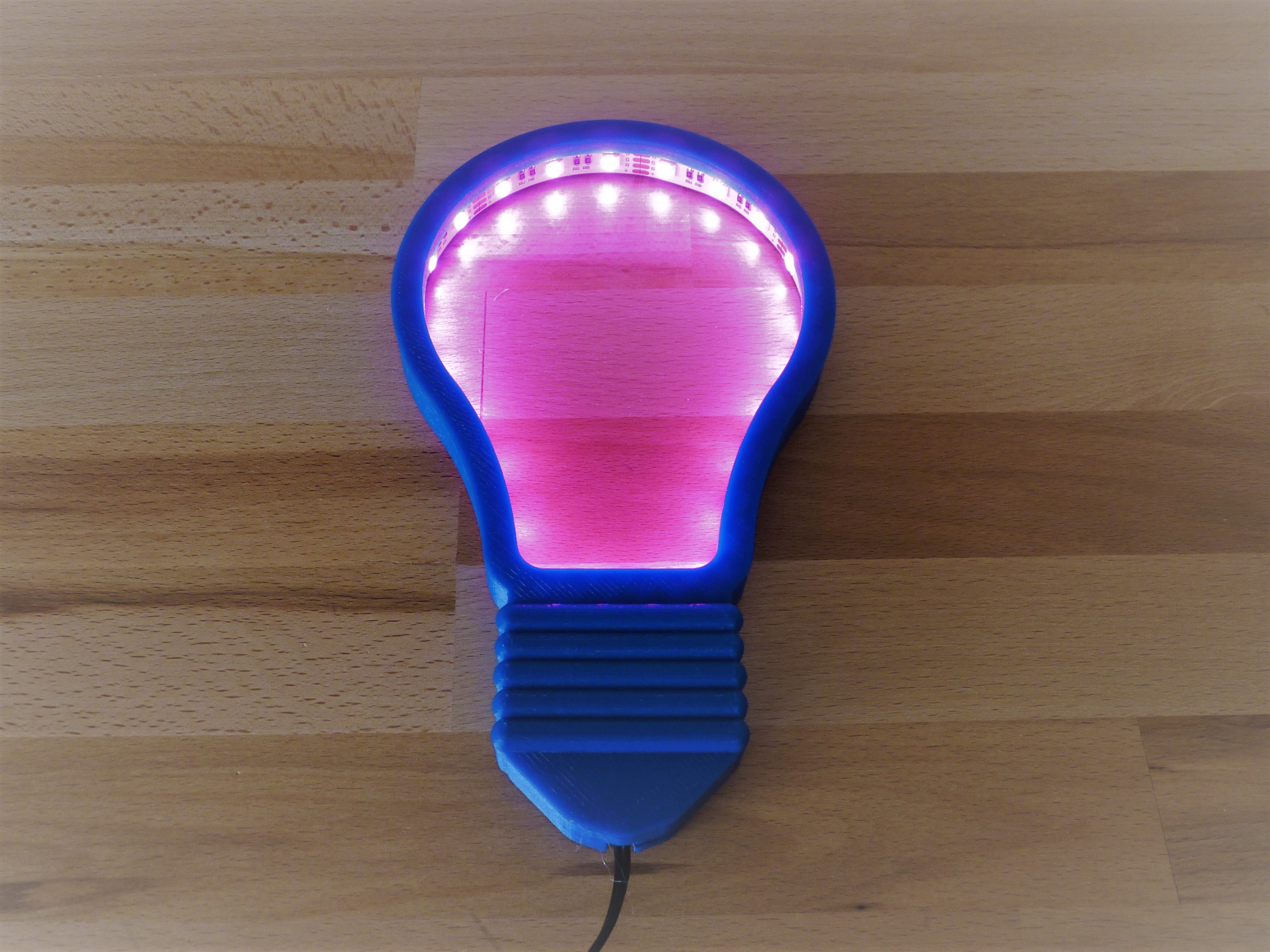 Incandescent light bulb symbol with LEDs