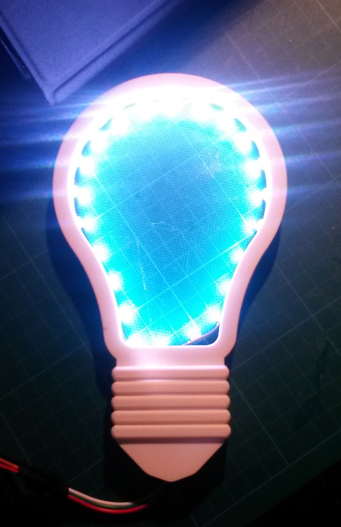 Incandescent light bulb symbol with LEDs